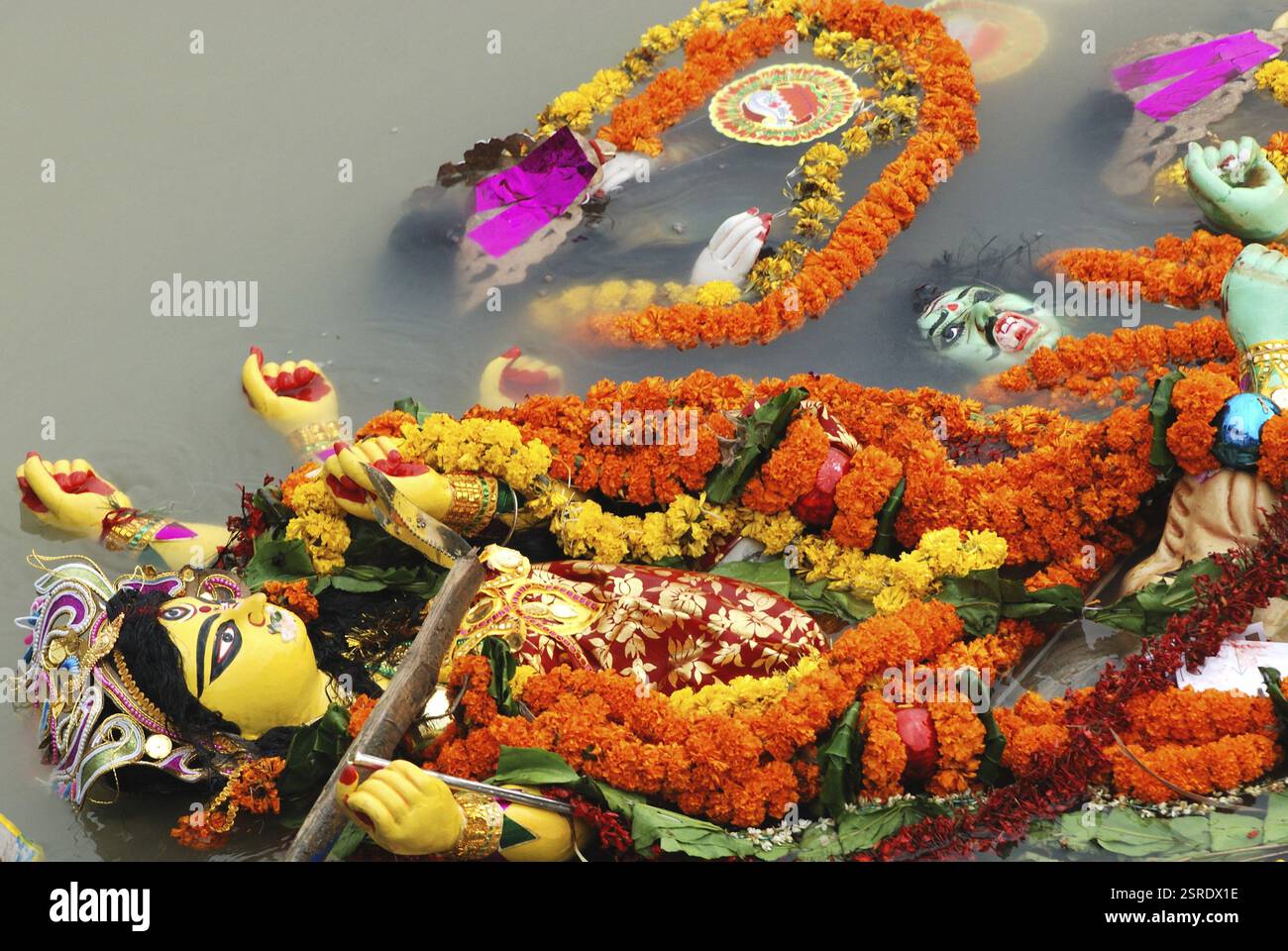 Durga Puja, ceremonial immersion of goddess in river Ganga, Howrah ...