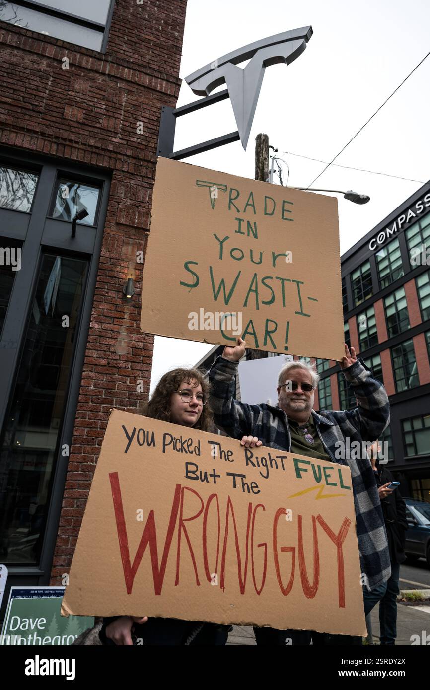 Seattle, USA. 15th Feb 2025. Activists gather during the Tesla Takeover ...