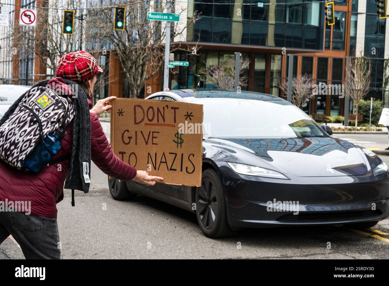 Seattle, USA. 15th Feb 2025. Activists gather during the Tesla Takeover ...