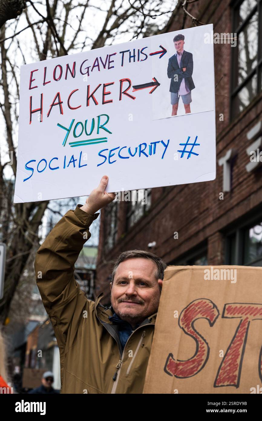 Seattle, USA. 15th Feb 2025. Activists gather during the Tesla Takeover ...