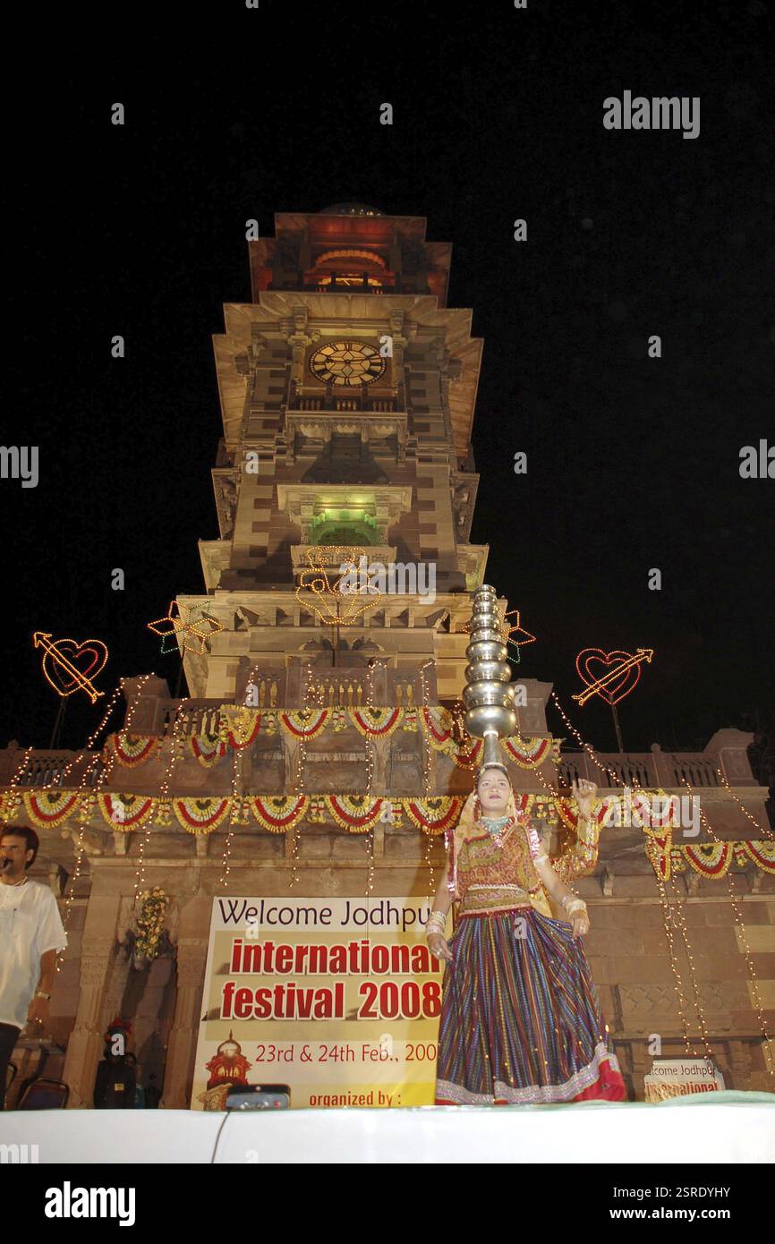 Folk dancer in front of clock tower, Jodhpur, Rajasthan, India, Asia ...