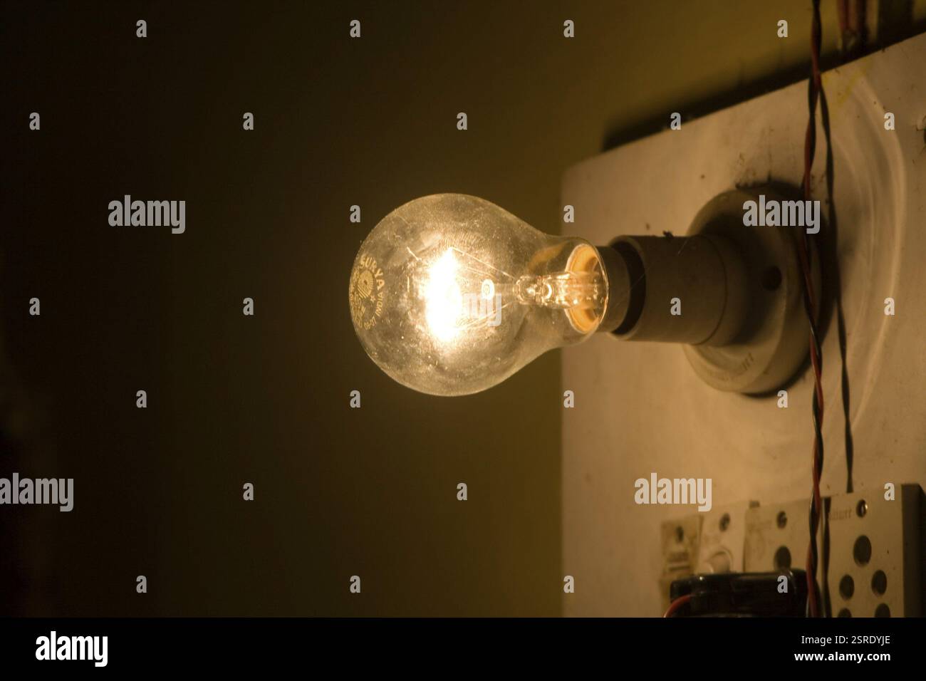 Bulb with electric circuit switch board, India, Asia Stock Photo - Alamy