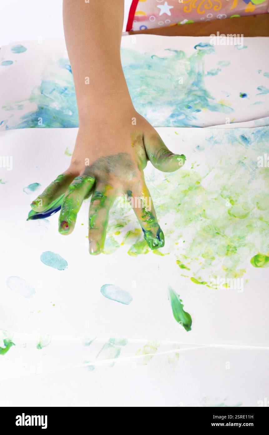 Paint with finger paints Stock Photo - Alamy