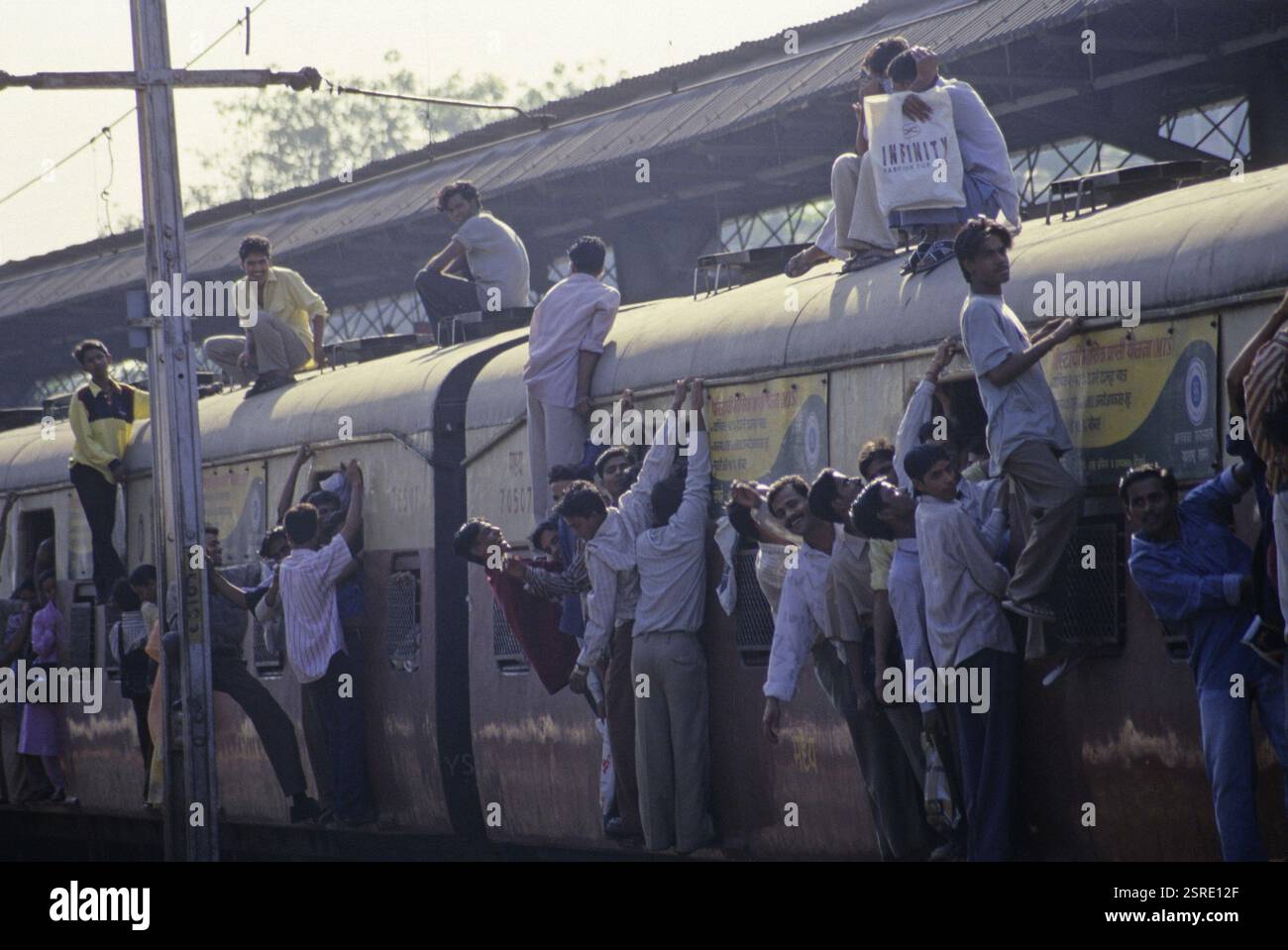 Crowded Mumbai local Train Stock Photo - Alamy