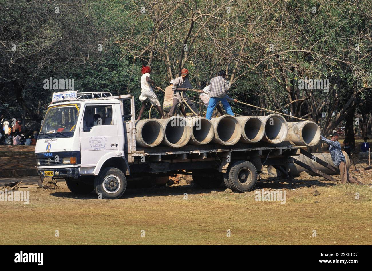 Loading of big pipes manually on TATA truck, Pune, Maharashtra, India ...