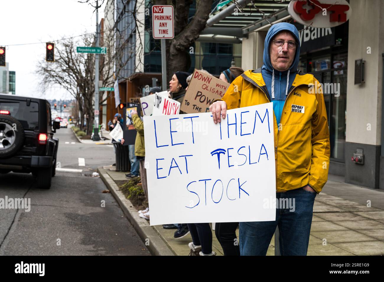 Seattle, USA. 15th Feb 2025. Activists gather during the Tesla Takeover ...