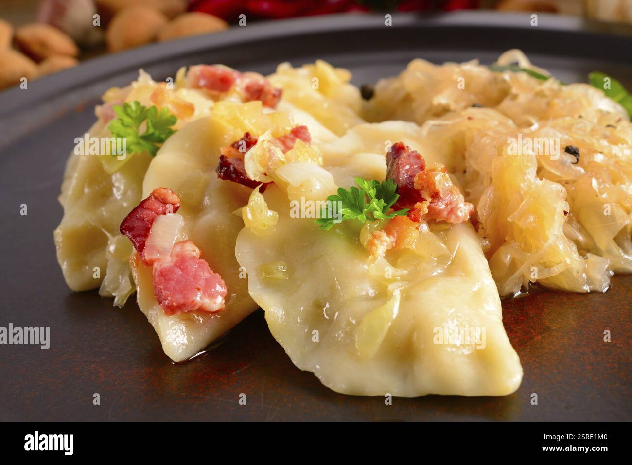 Pierogi.Polish dish pierogi with sauerkraut and mushrooms Stock Photo ...