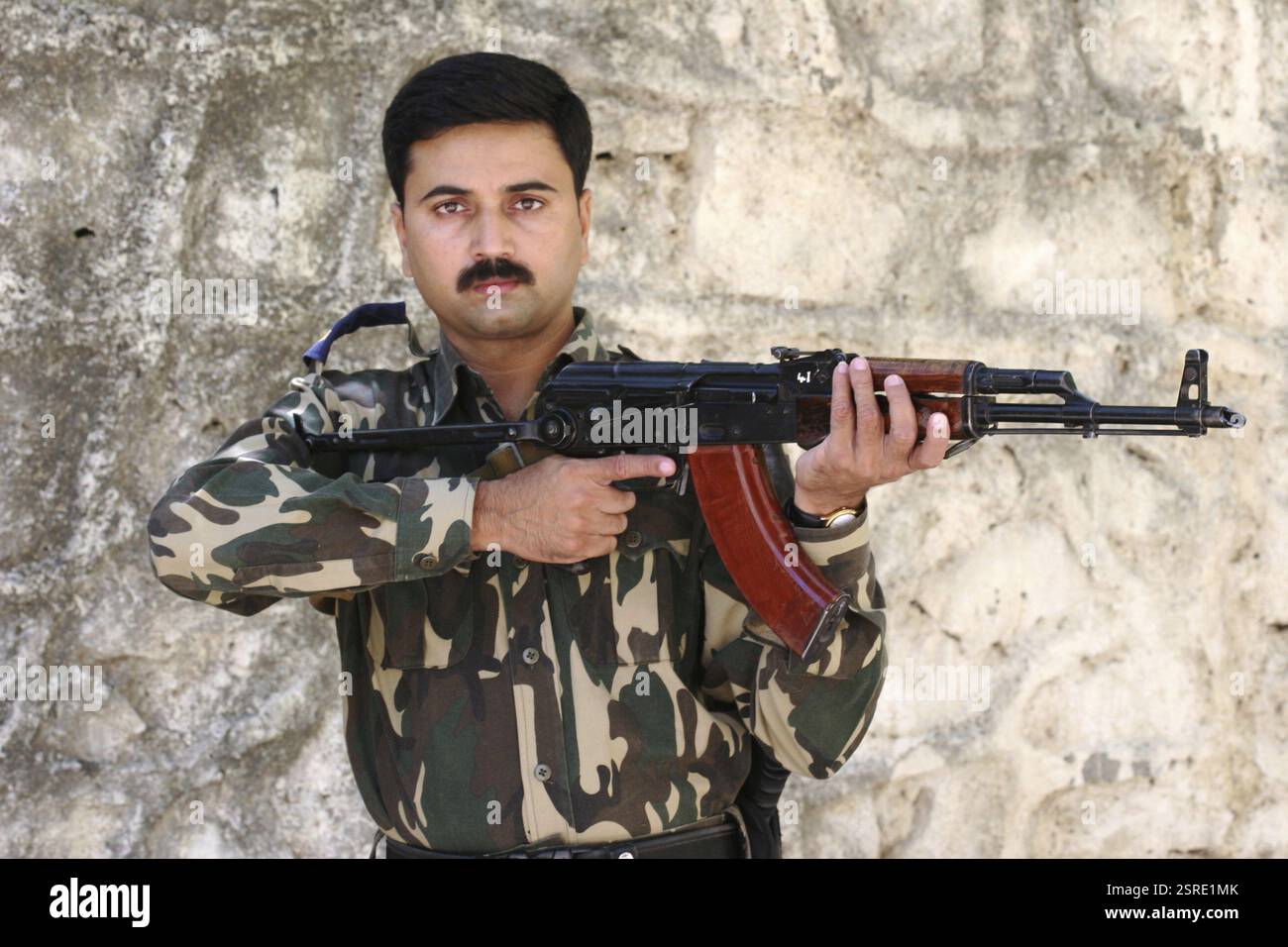 Black Cat commando with an AK 47 light machine gun MR#725 Stock Photo ...