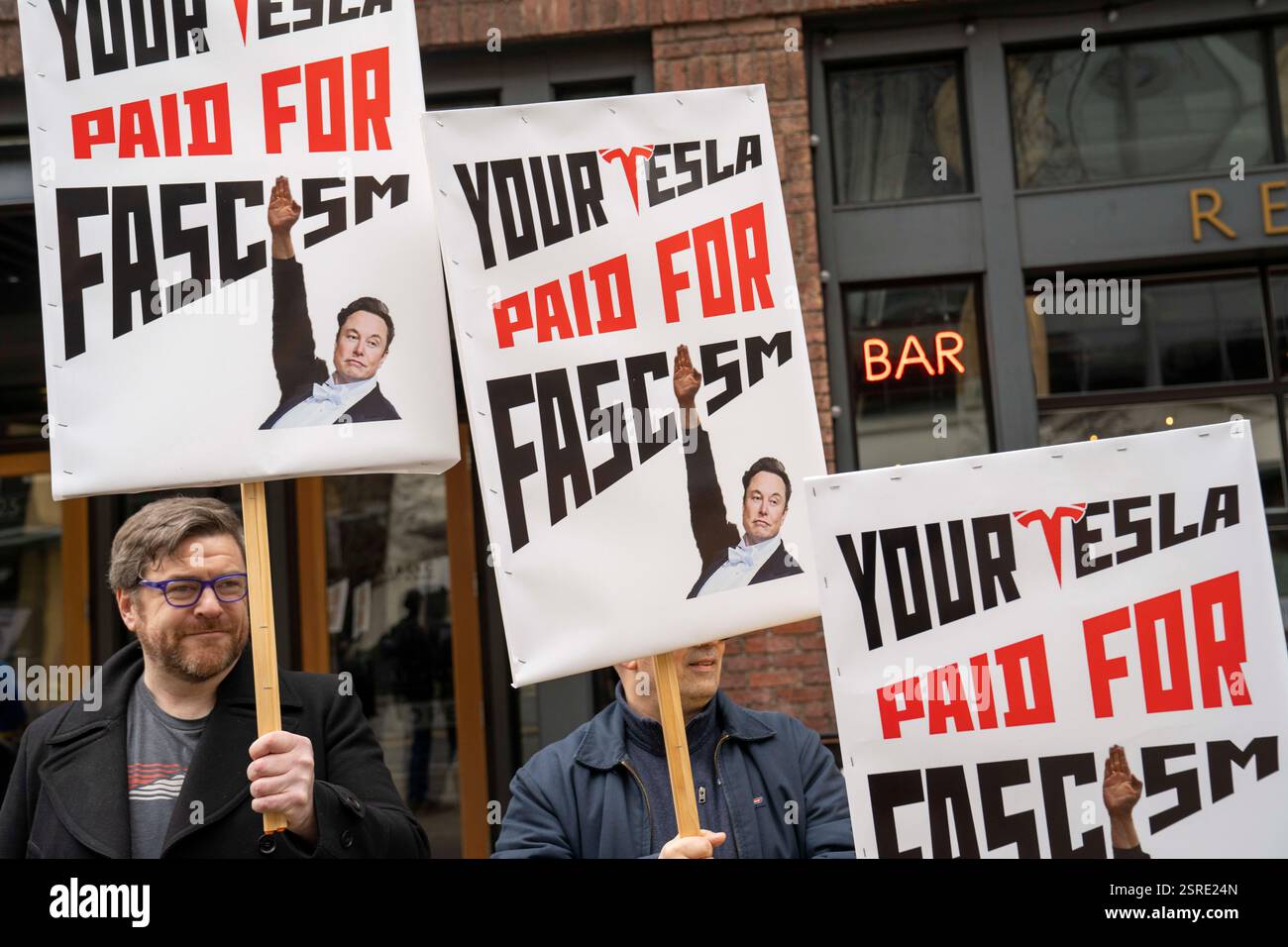 Seattle, Washington, USA. 15th Feb, 2025. People protest against Elon ...