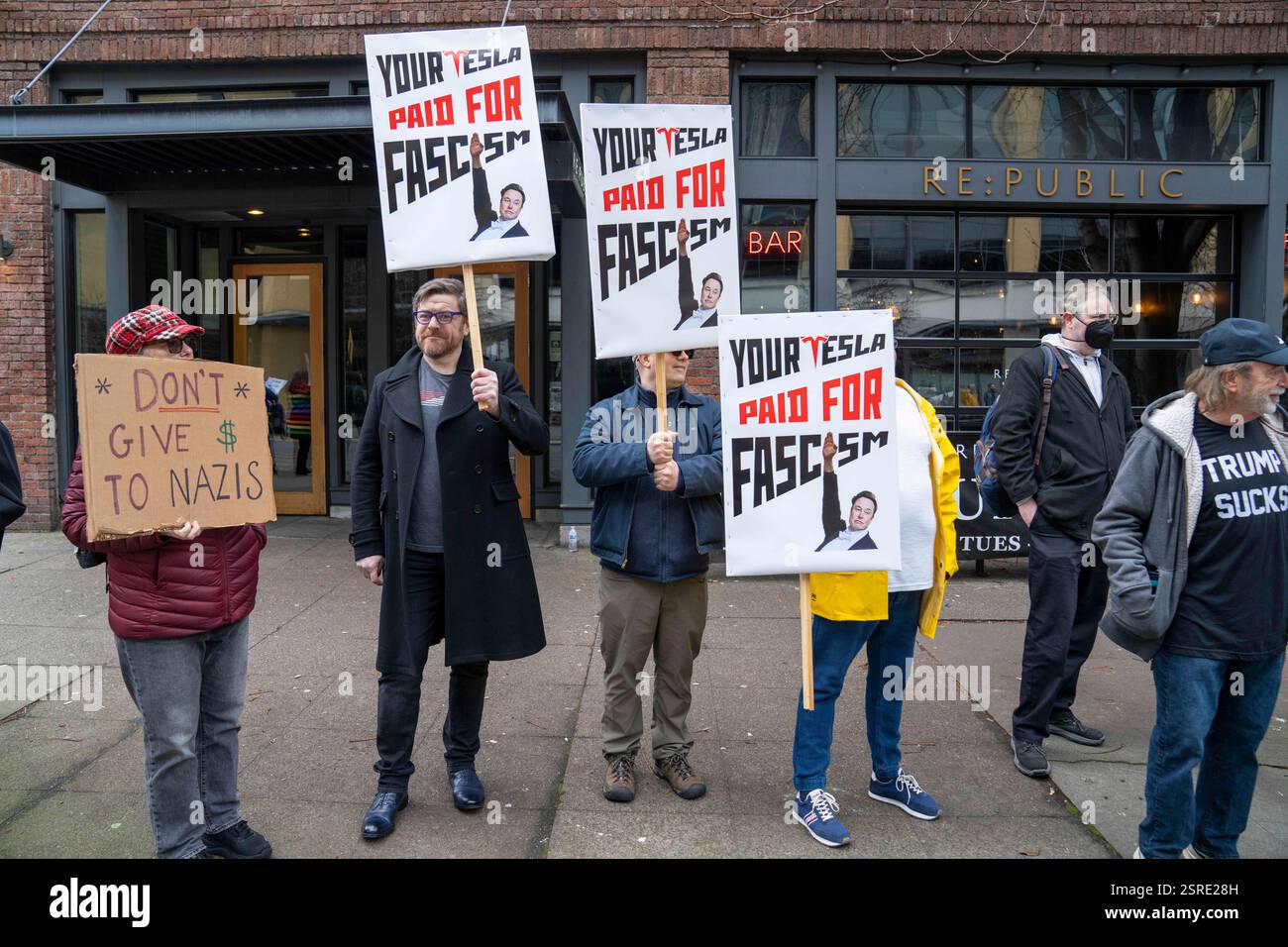 Seattle, Washington, USA. 15th Feb, 2025. People protest against Elon ...