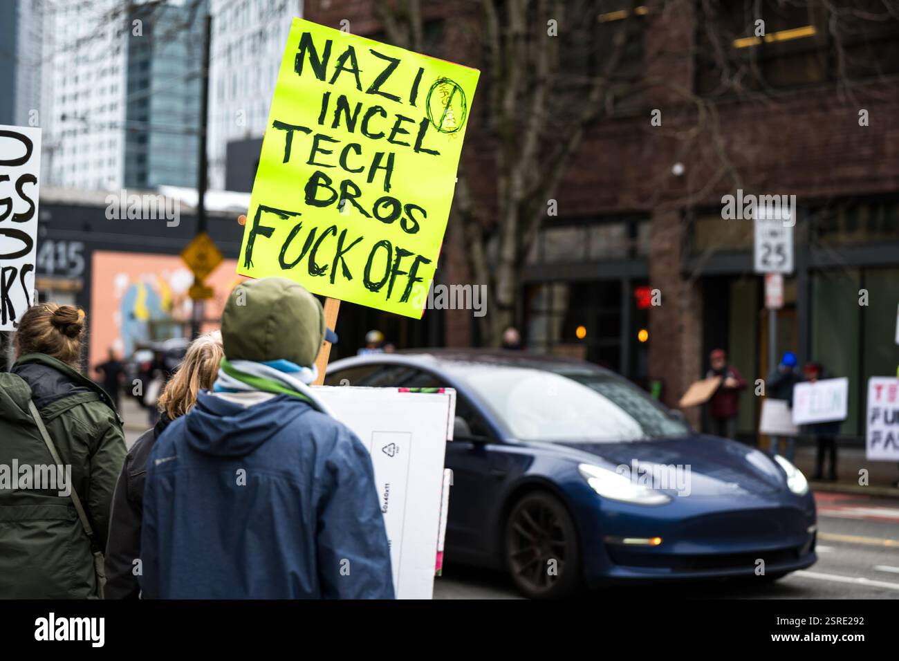 Seattle, USA. 15th Feb 2025. Activists gather during the Tesla Takeover ...