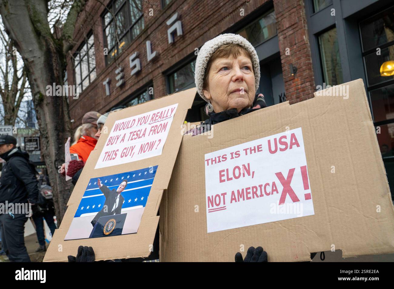 Seattle, Washington, USA. 15th Feb, 2025. People protest against Elon ...