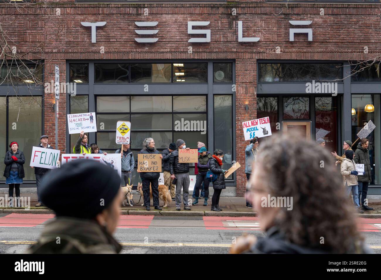 Seattle, Washington, USA. 15th Feb, 2025. People protest against Elon ...