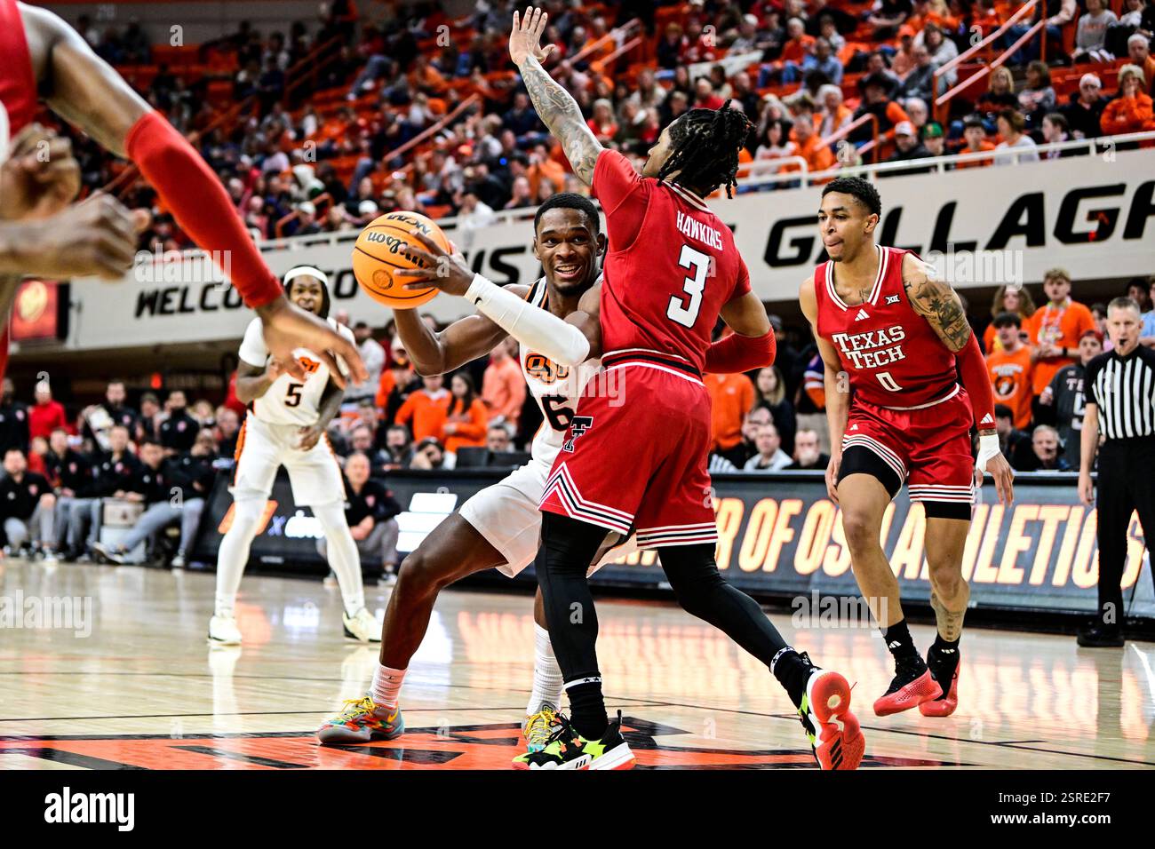 Oklahoma State guard Brandon Newman (6) looks to pass against Texas ...