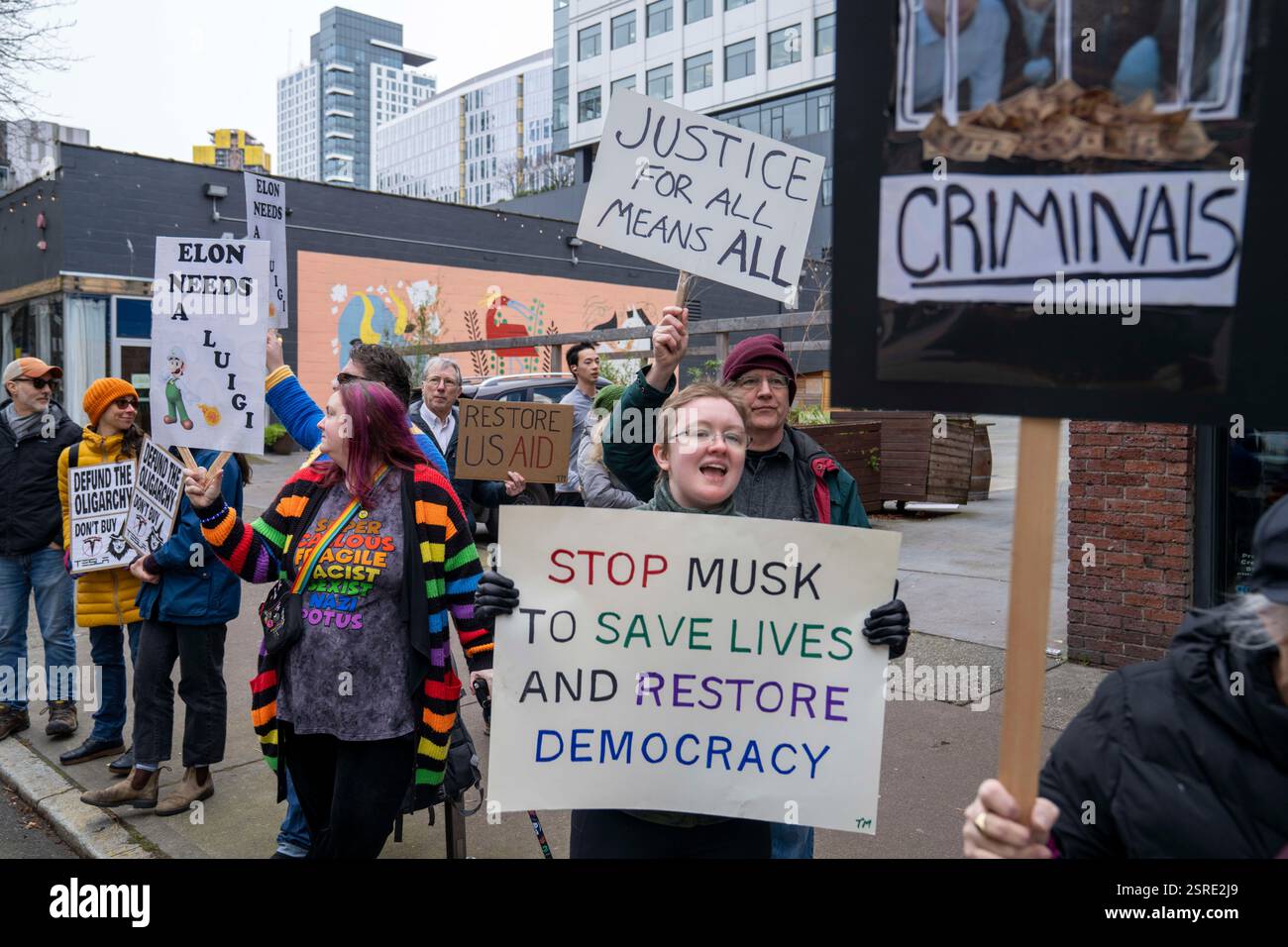Seattle, Washington, USA. 15th Feb, 2025. People protest against Elon ...