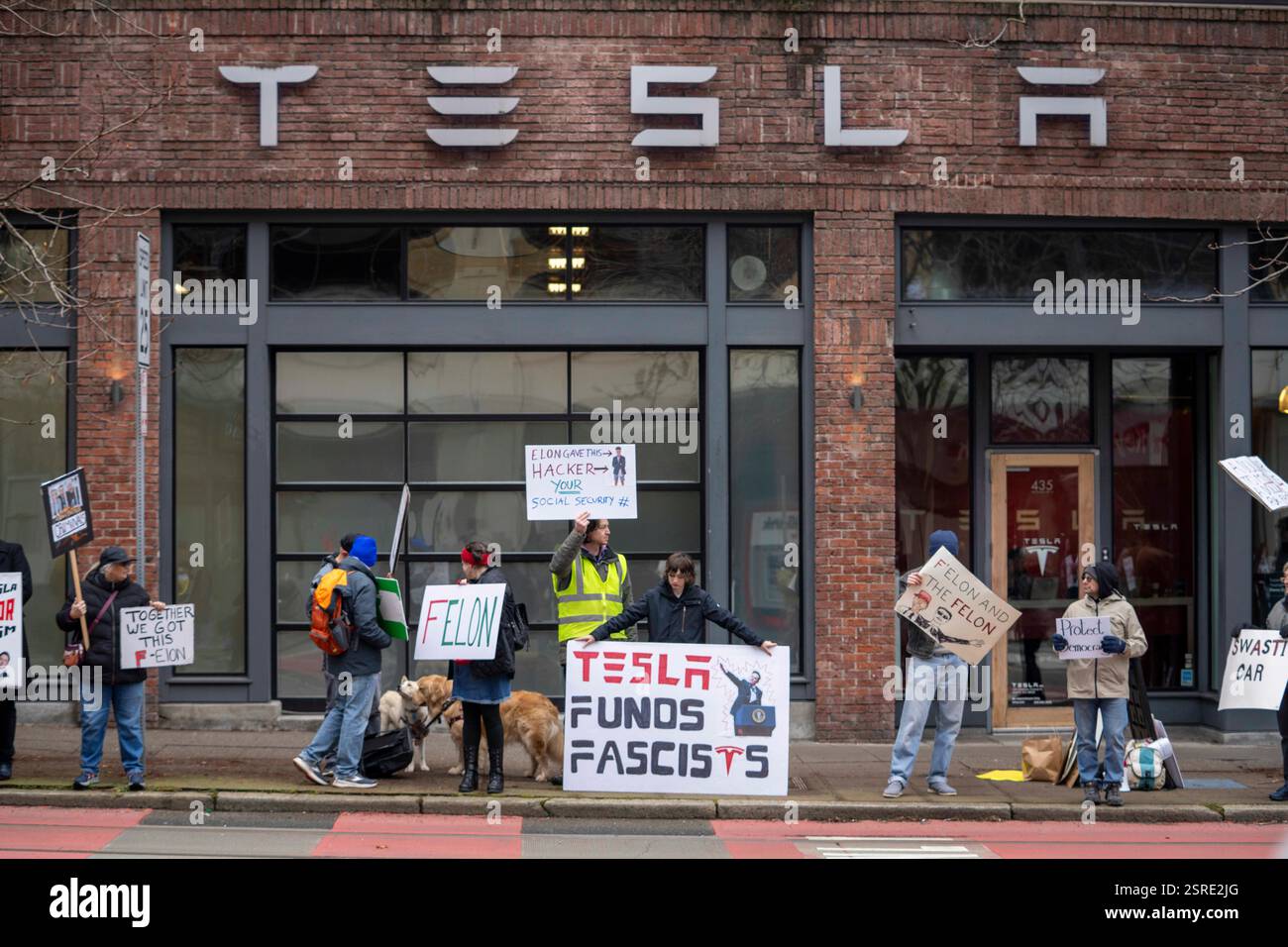 Seattle, Washington, USA. 15th Feb, 2025. People protest against Elon ...