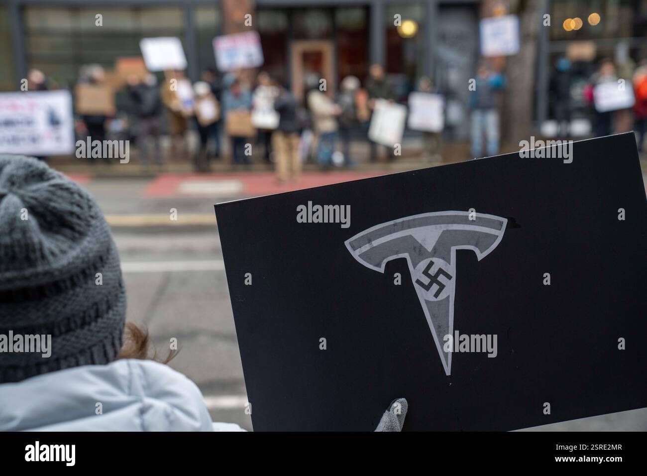 Seattle, Washington, USA. 15th Feb, 2025. People protest against Elon ...
