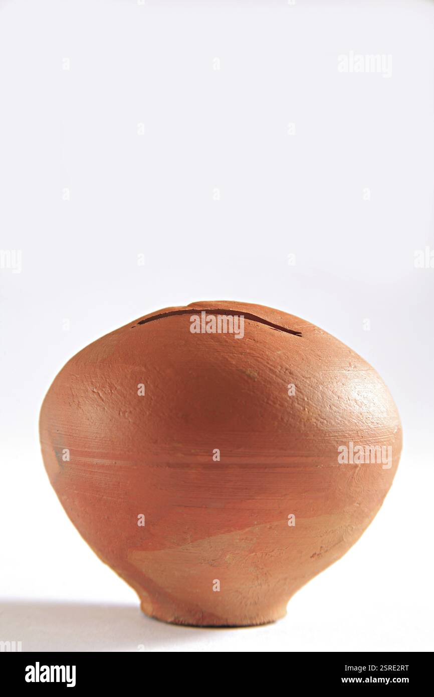 Concept, gullak clay bag or box for keeping wealth on white background ...