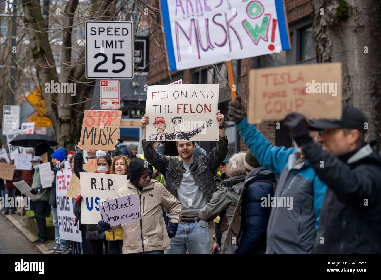 Seattle, Washington, USA. 15th Feb, 2025. People protest against Elon ...
