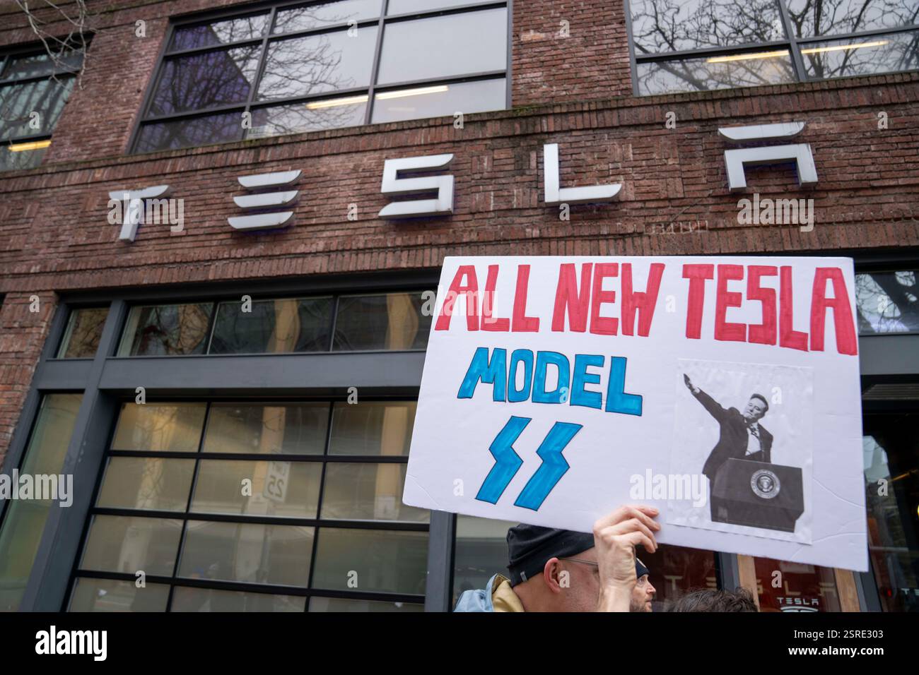 Seattle, Washington, USA. 15th Feb, 2025. People protest against Elon ...