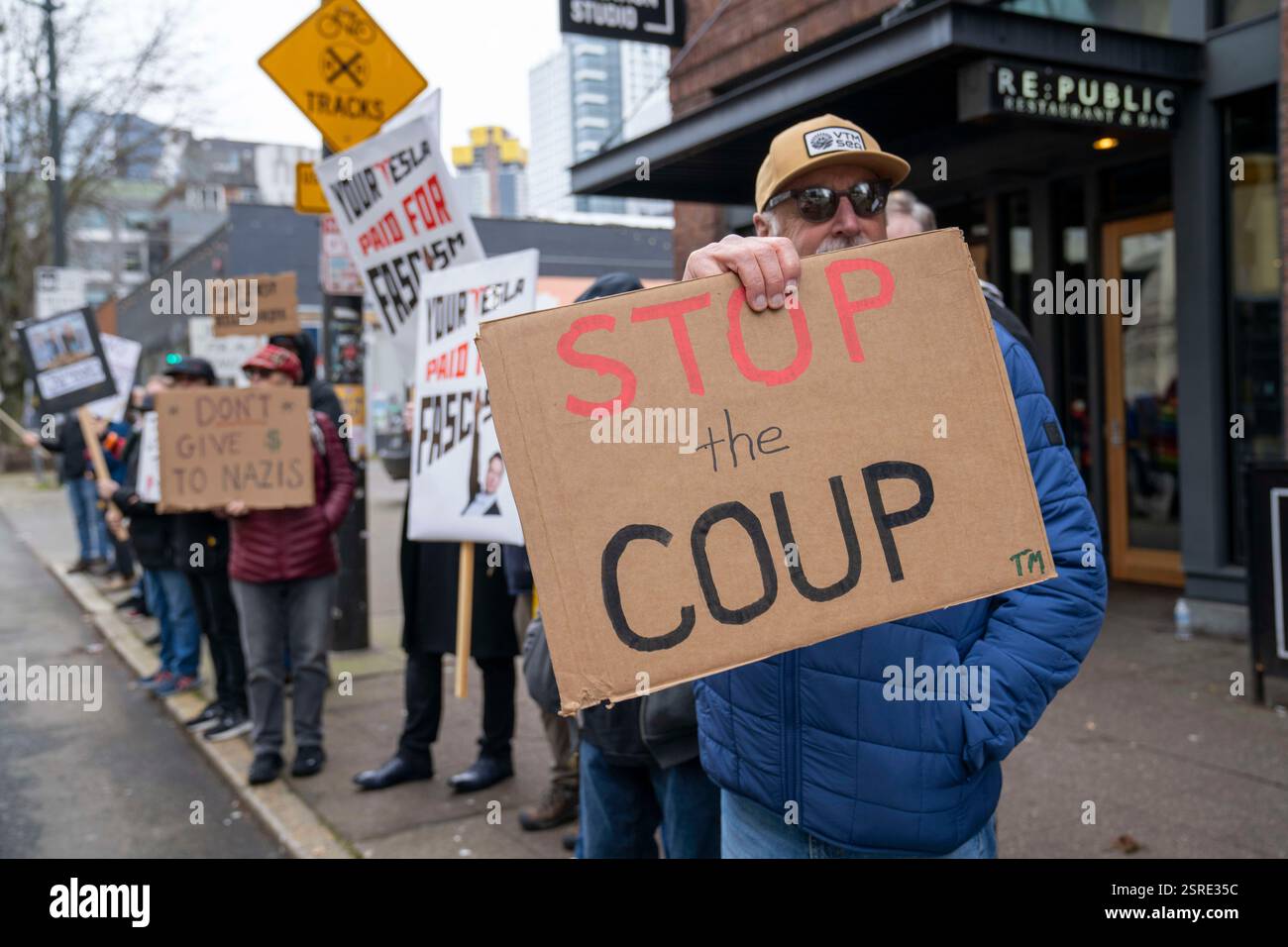 Seattle, Washington, USA. 15th Feb, 2025. People protest against Elon ...