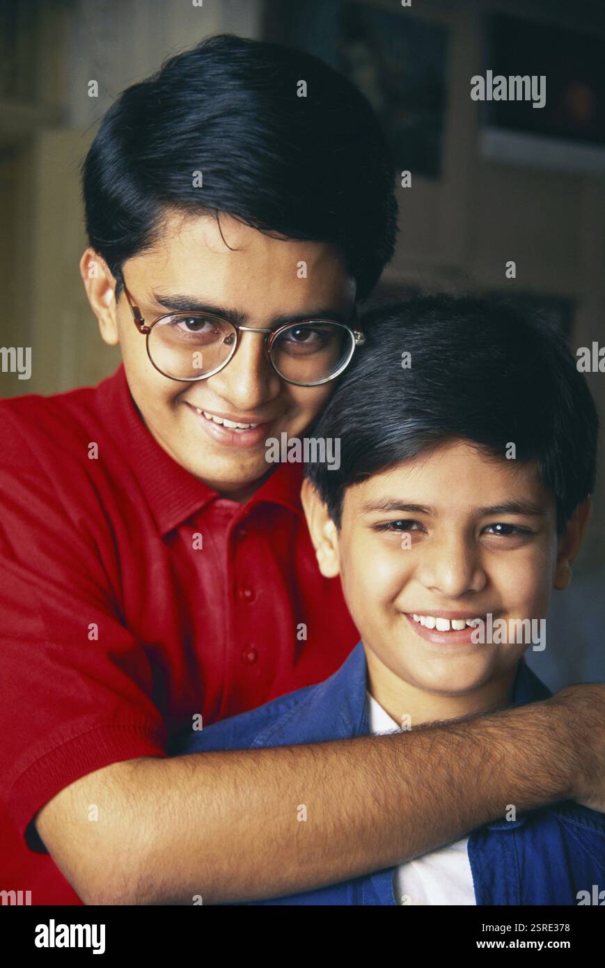 Brothers standing together MR#168, 169 Stock Photo - Alamy