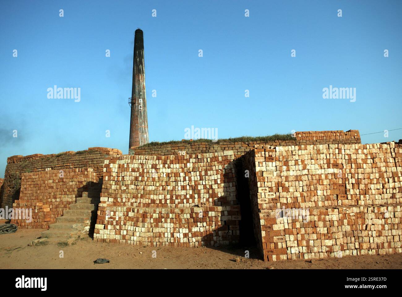 Chimney emitting smoke at brickyard in Doulo Nangal village in Amritsar ...