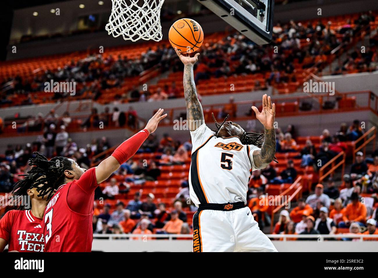 Oklahoma State guard Khalil Brantley (5) shoots the ball against Texas ...