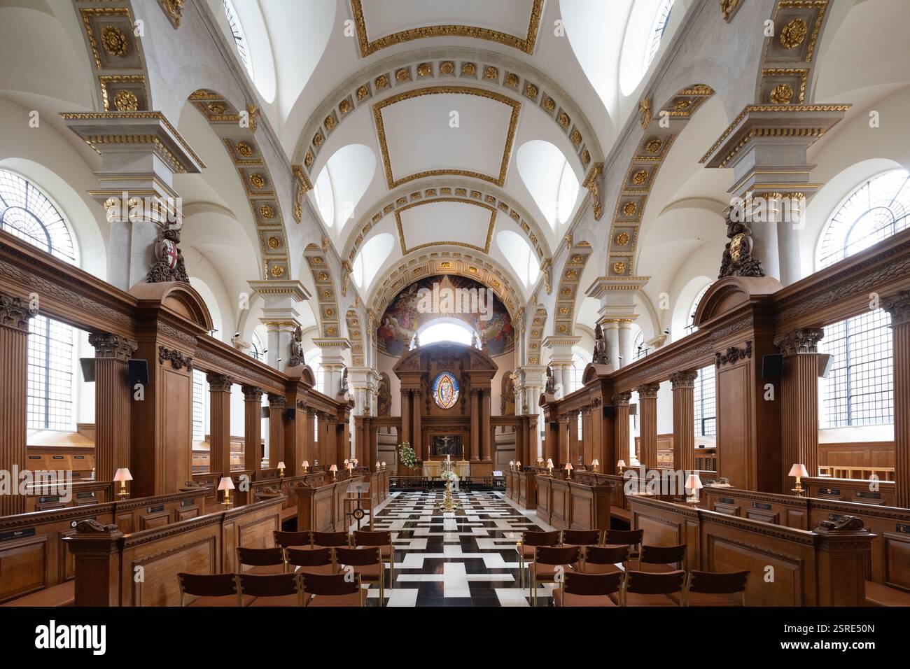 Interior of St. Bride's Church, featuring ornate columns, arches, and ...