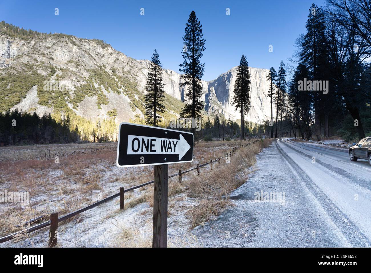 One-way road sign near El Capitan, Yosemite National Park, CA. Road is ...