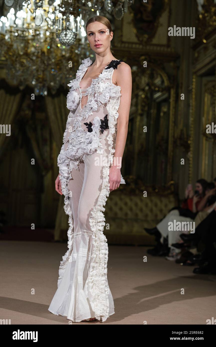 Madrid, Spain. 15th Feb, 2025. A model parades with Adlib Ibiza in Madrid es Moda design during ...