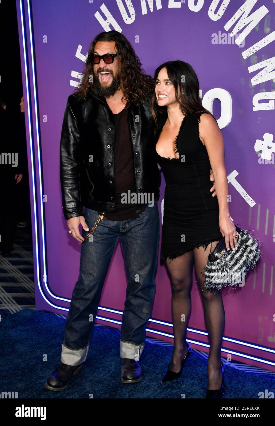 Jason Momoa, leftt, and Adria Arjona attend the SNL50: The Homecoming ...