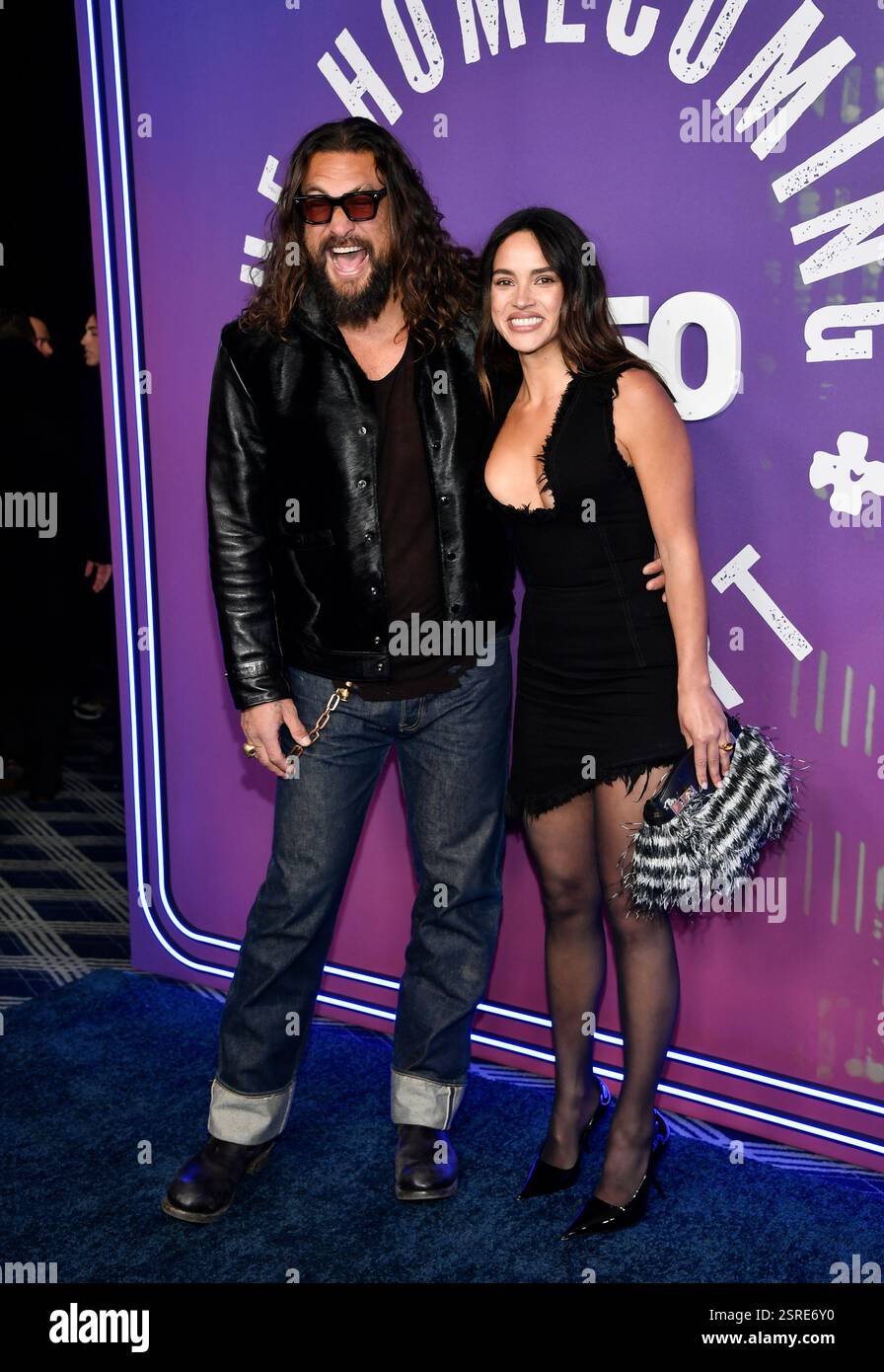 Jason Momoa, leftt, and Adria Arjona attend the SNL50: The Homecoming ...