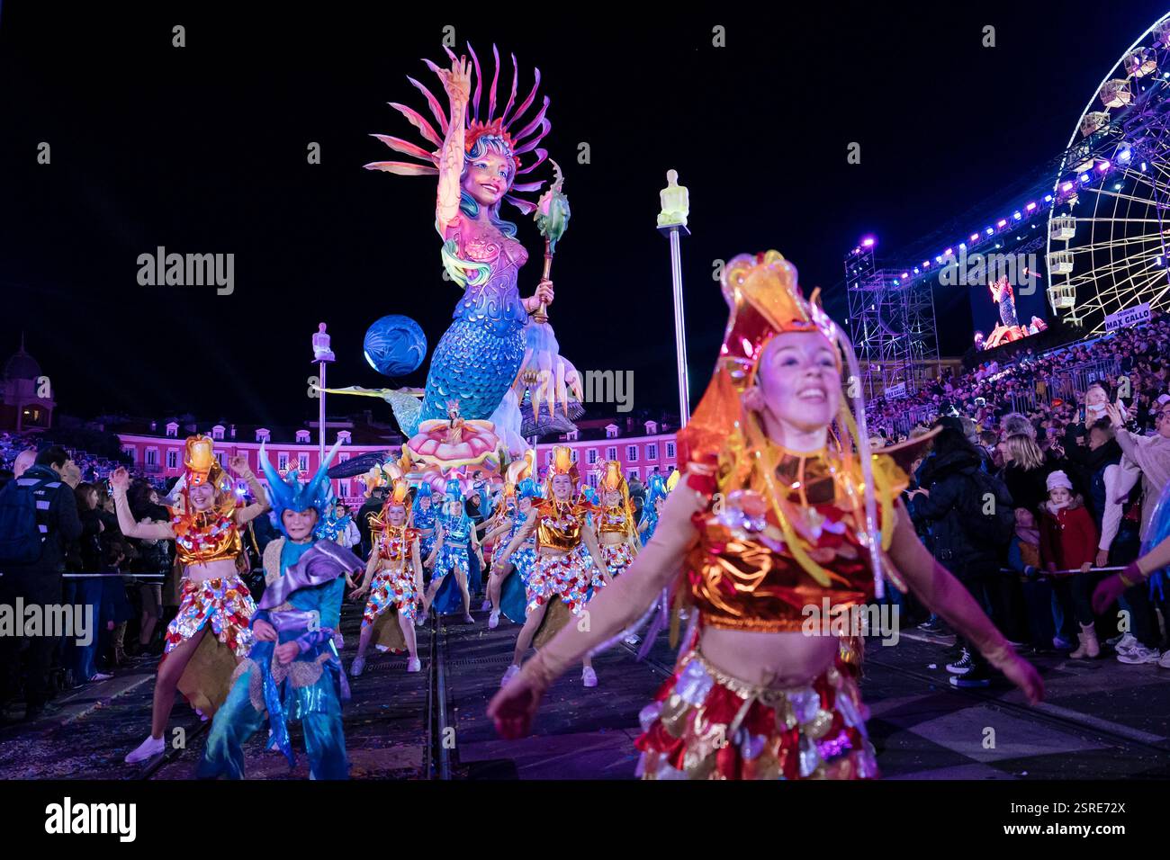 A carnival float parades through Place Massena during the opening ...