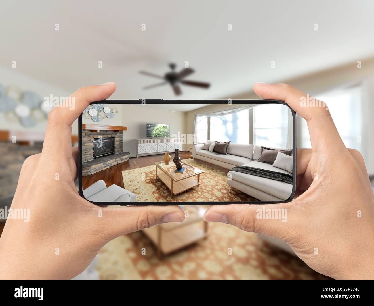 Person taking a photo of a modern residential virtually staged living ...