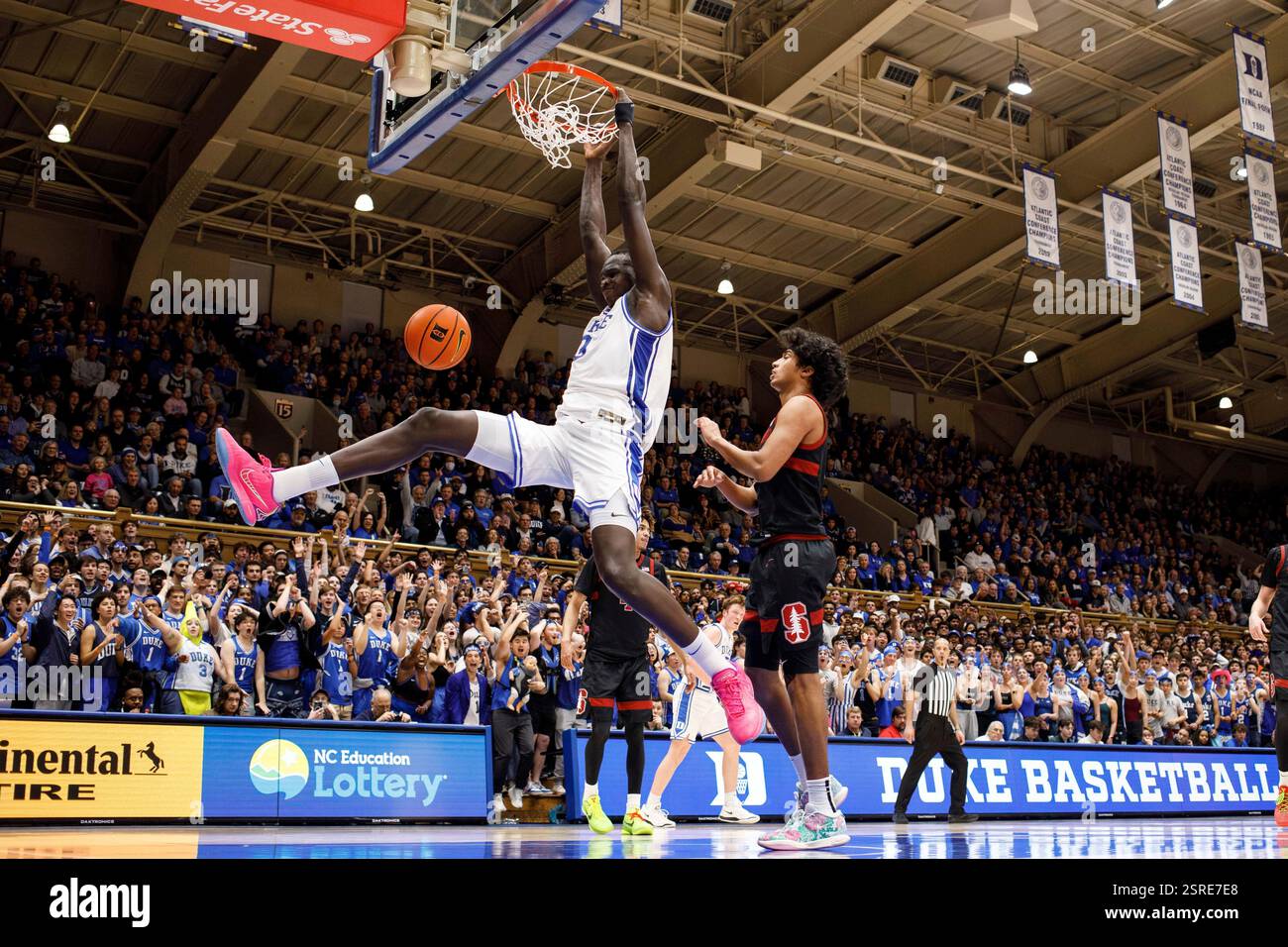Duke's Khaman Maluach (9) dunks ahead of Stanford's Ryan Agarwal (11 ...