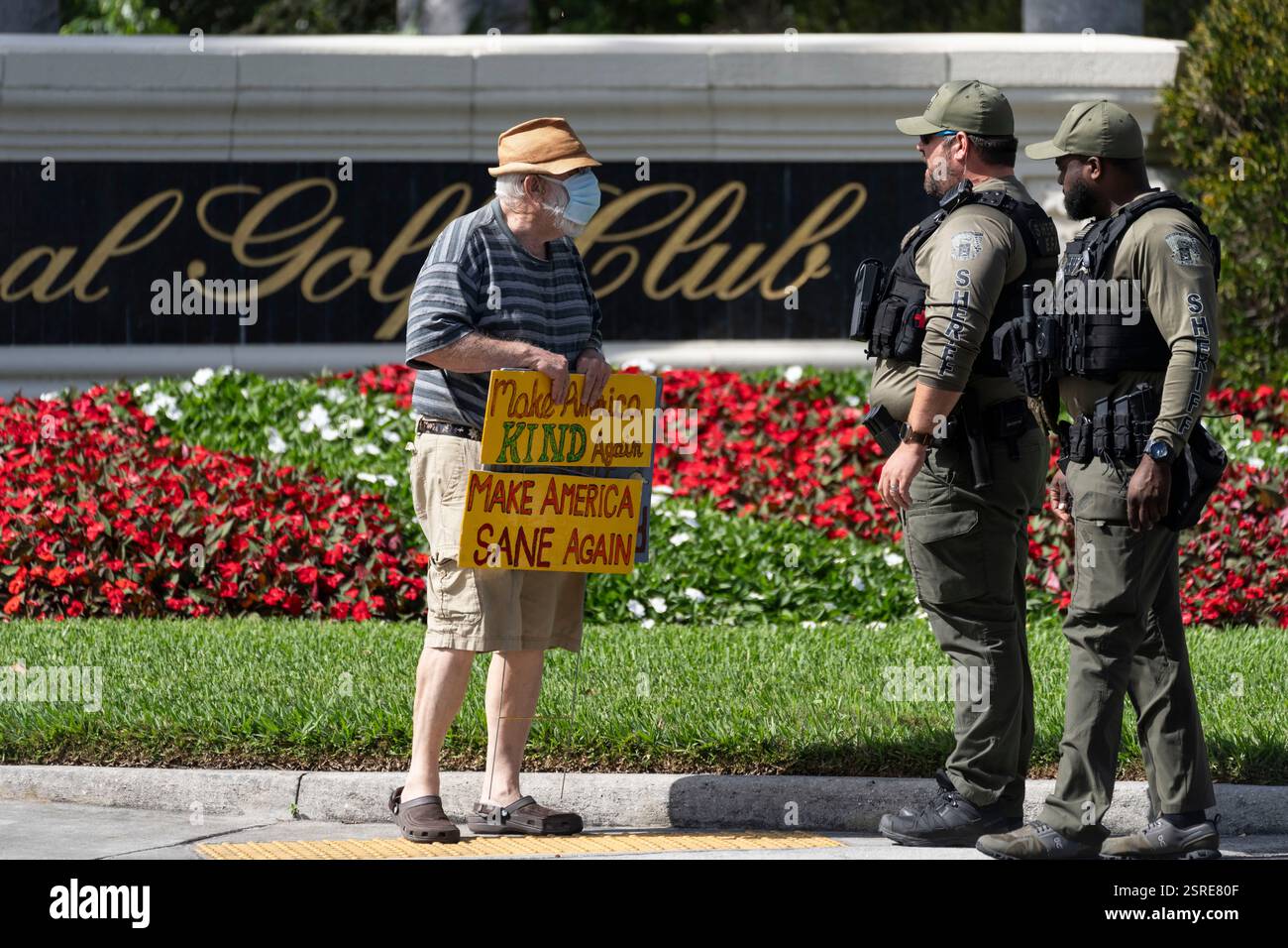 Officers from the Sheriff's Department advise demonstrator and veteran ...