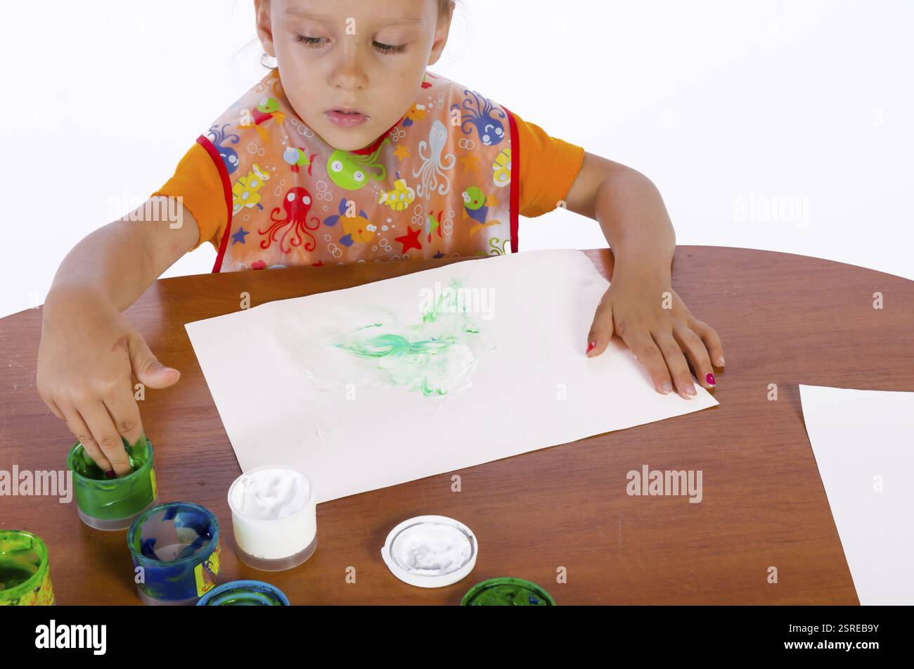 Child paints hand paint hi-res stock photography and images - Alamy
