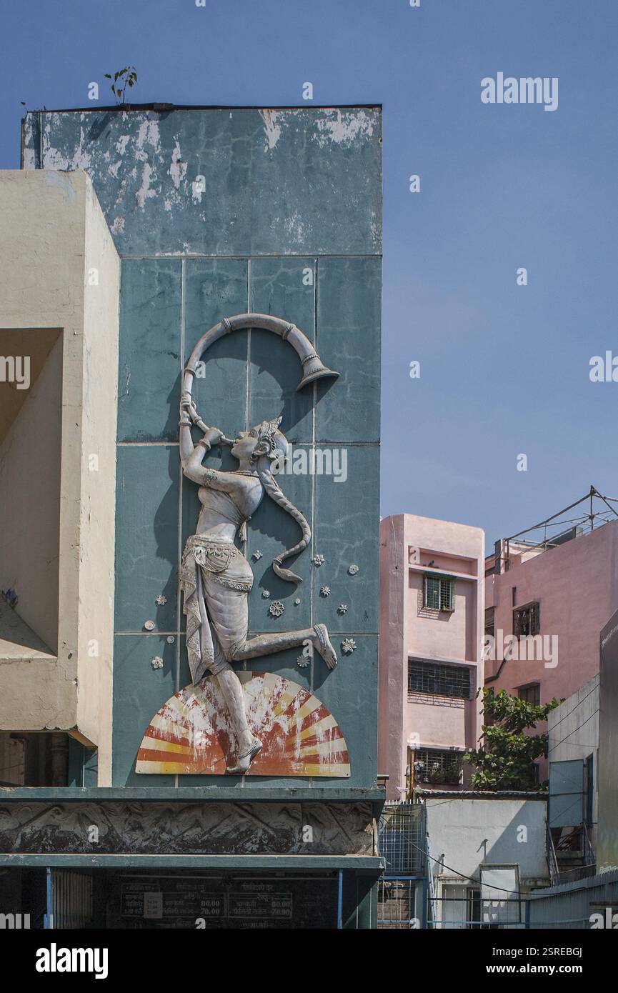 Woman blowing trumpet sculpture building, Cinema hall, Solapur ...