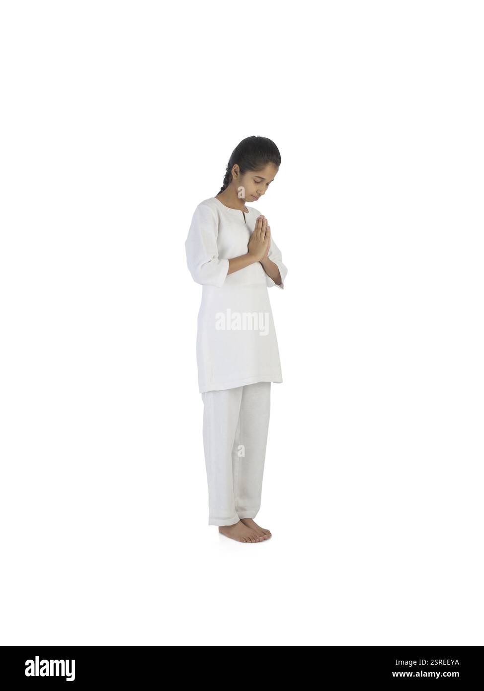 Girl practicing Namaskar asana MR#779J Stock Photo - Alamy