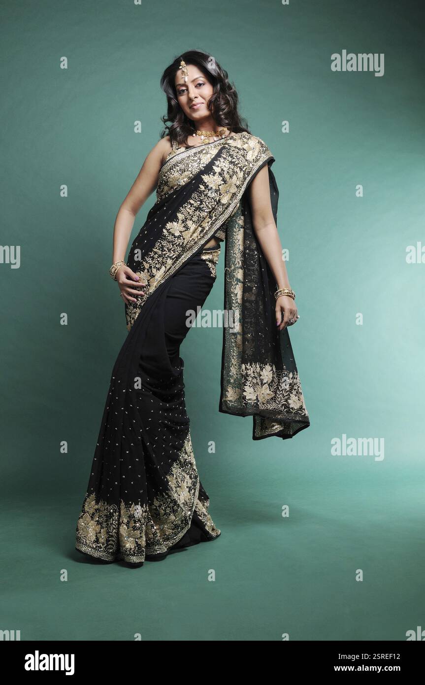 Woman in black sari, India MR-719I Stock Photo - Alamy