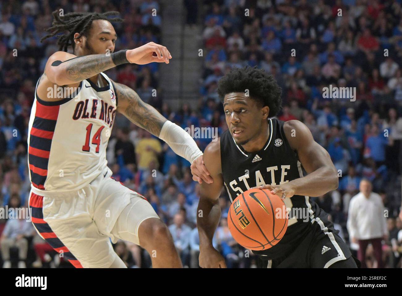 Mississippi State guard Josh Hubbard drives against Mississippi guard ...