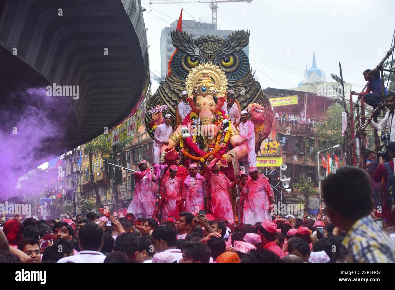 A gigantic idol of Hindu elephant-headed god Ganesh, being led to the ...