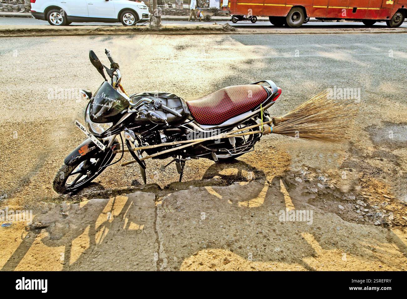 Broom tied on bike, Chandrapur, Maharashtra, India, Asia Stock Photo - Alamy