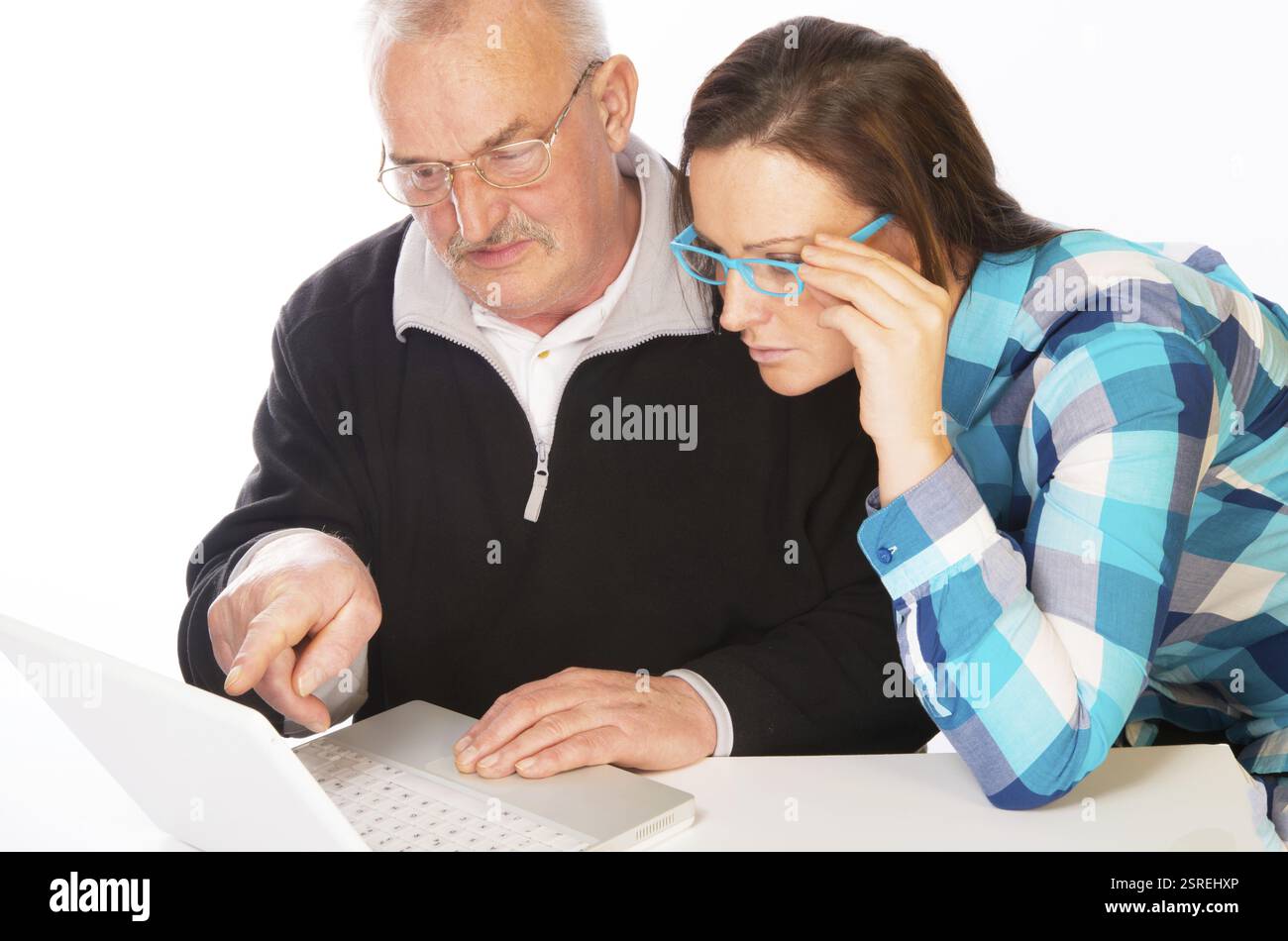Helping with new computer Stock Photo - Alamy