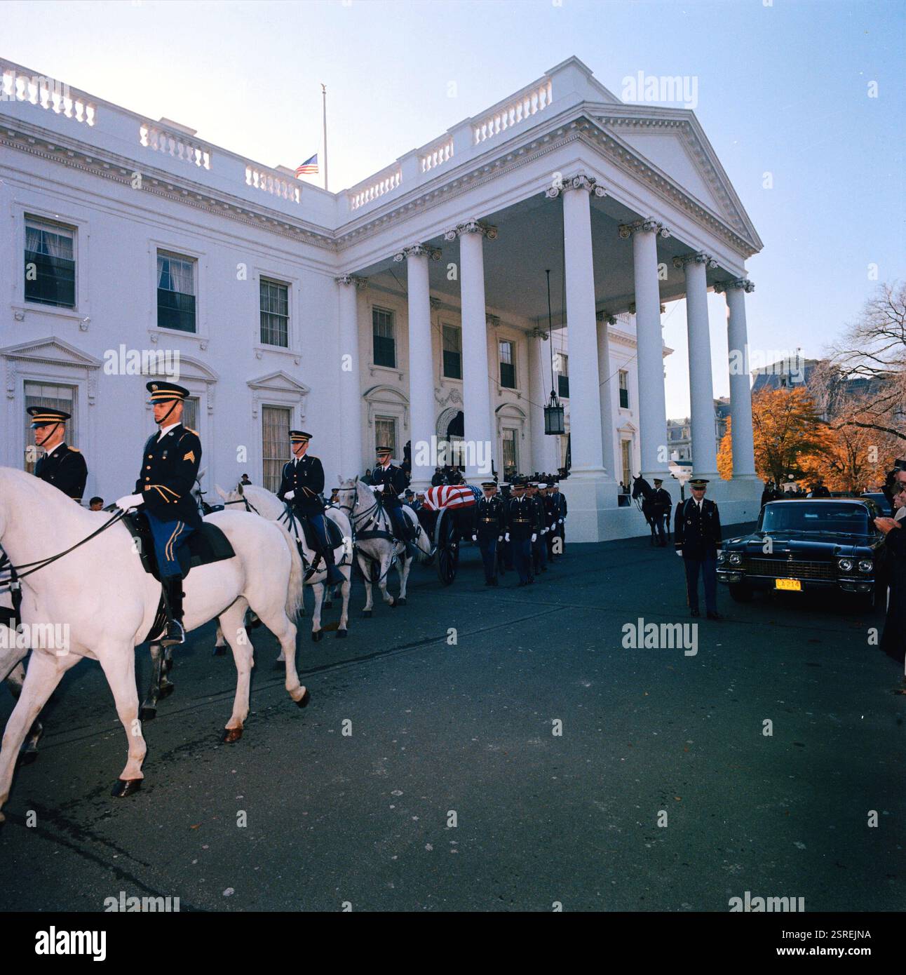 The funeral procession of President John F. Kennedy departs the White ...