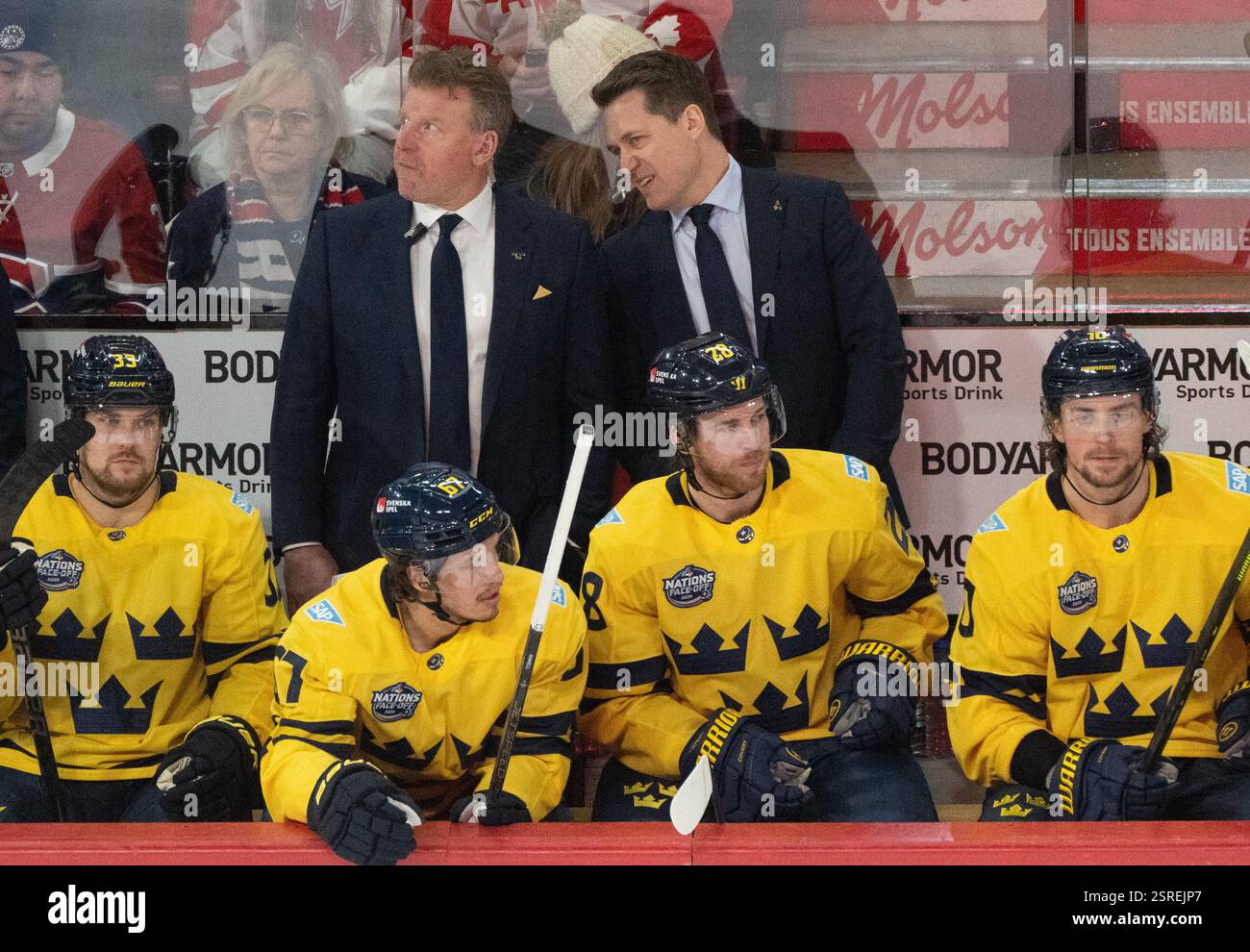 Montreal, Canada. 15th Feb, 2025. Sweden head coach Sam Hallam, right ...