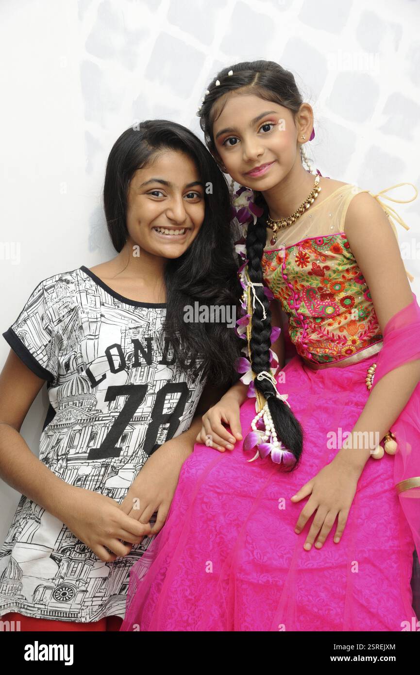 Two beautiful sisters smiling, India, Asia, MR#736L, MR#682W, Asia ...