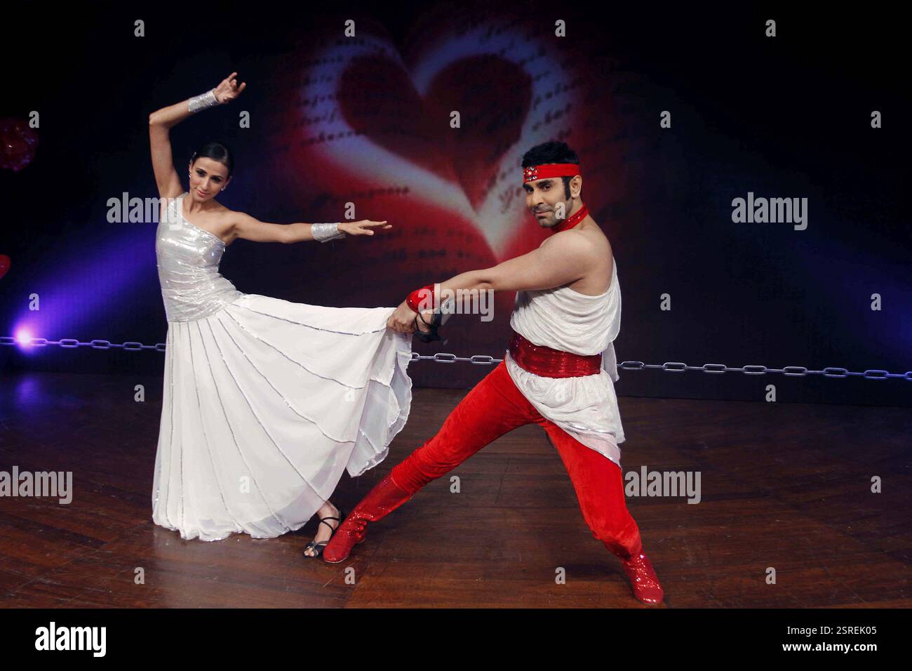 Bollywood choreographer Sandip Soparrkar and model Alesia Raut poses ...