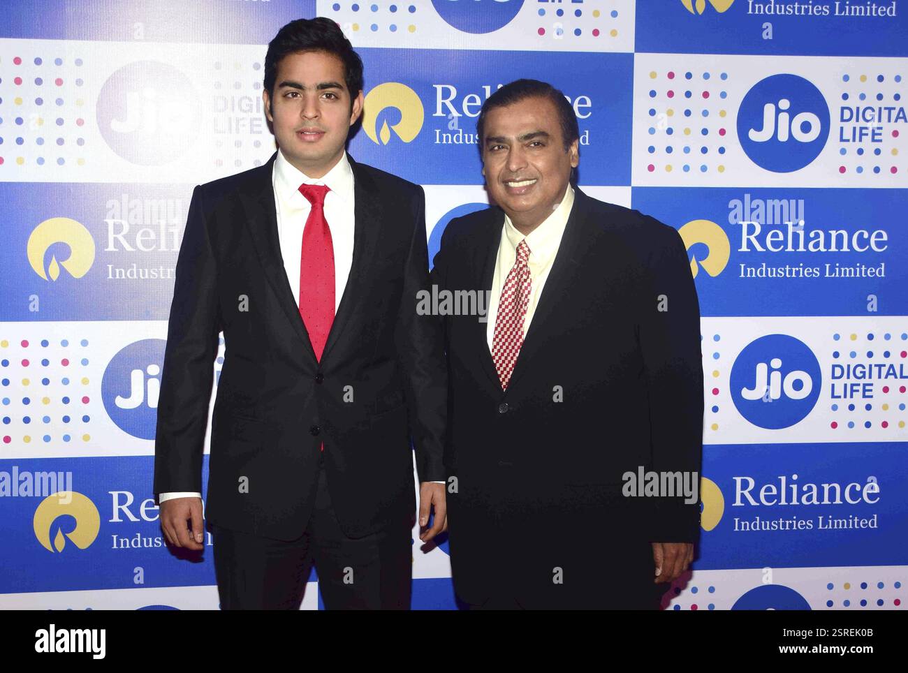 Reliance Industries Limited Chairman Mukesh Ambani with his son Akash Ambani Annual General ...